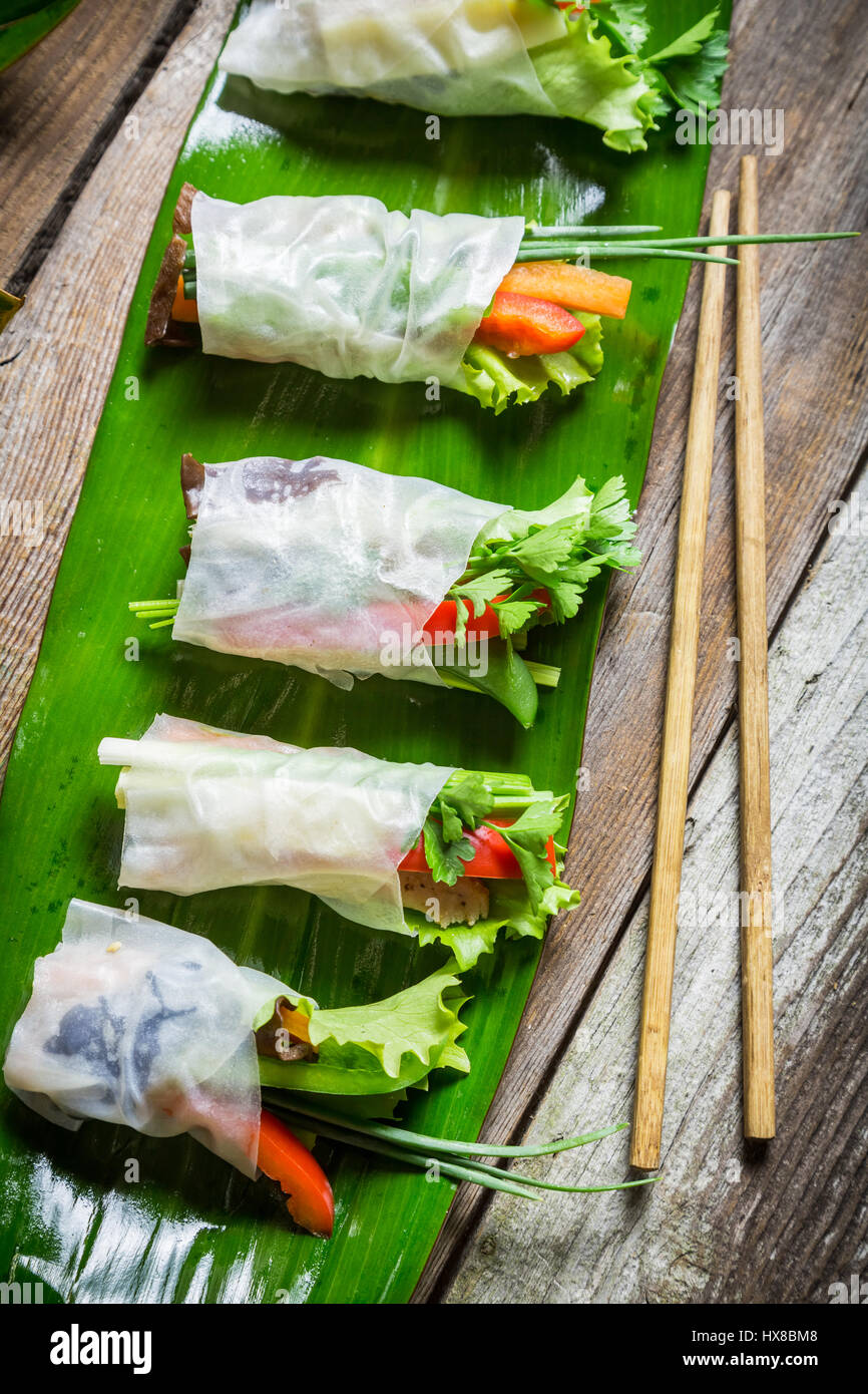 Fresh spring rolls wrapped in rice paper Stock Photo - Alamy