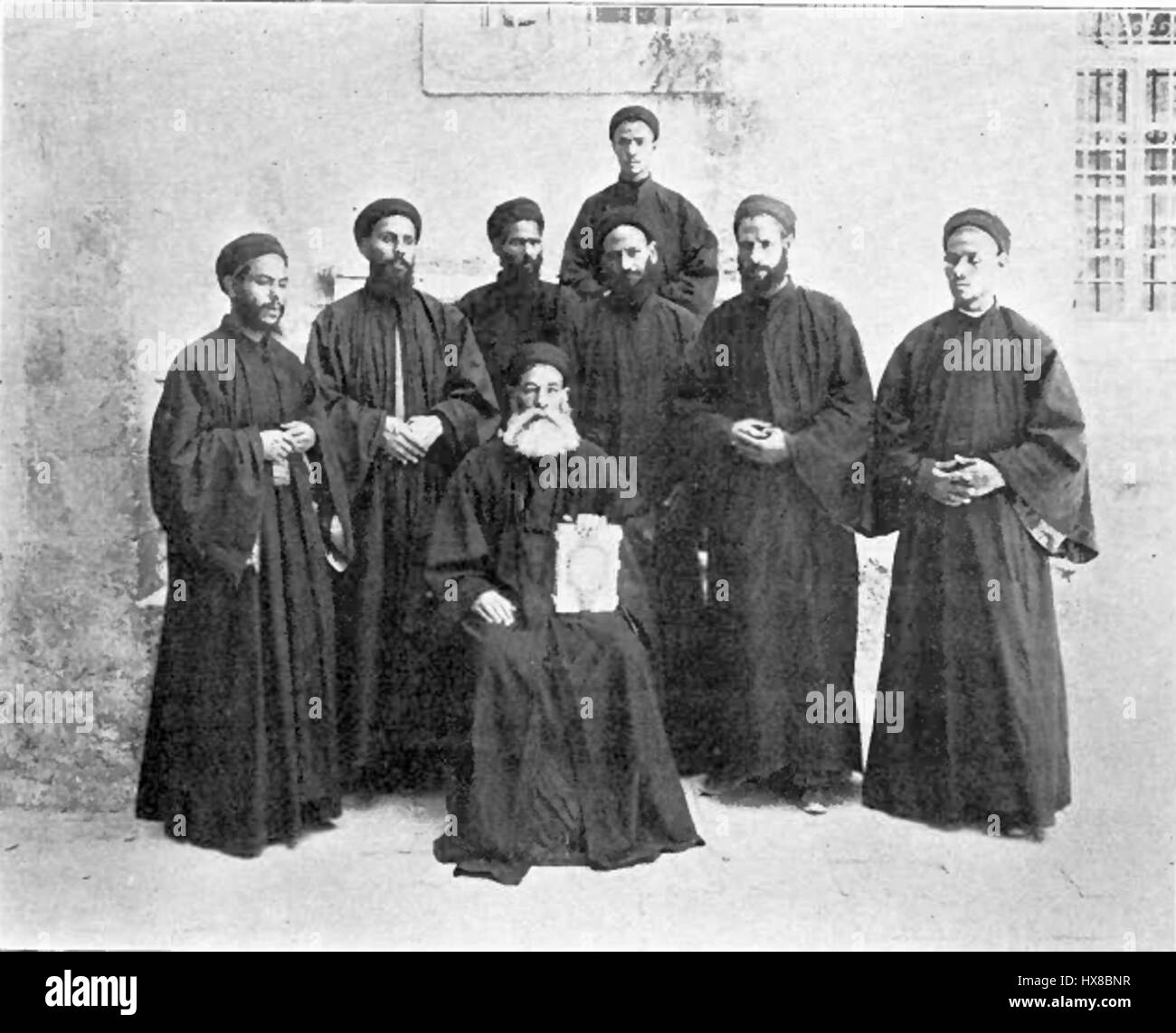 This image from 1906 depicts a priest, likely capturing the essence of ...