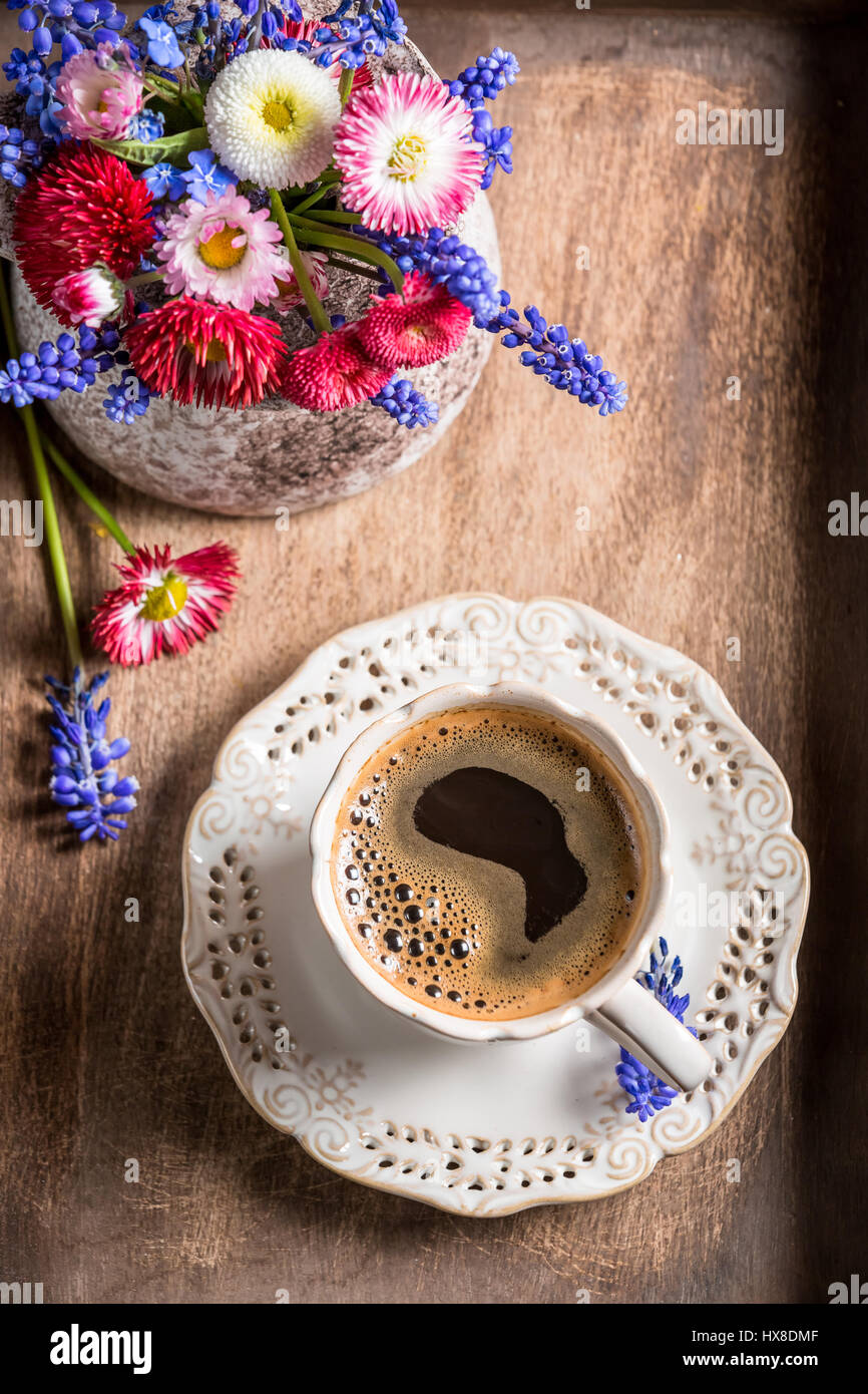 Coffee and spring flowers on old wooden tray Stock Photo - Alamy