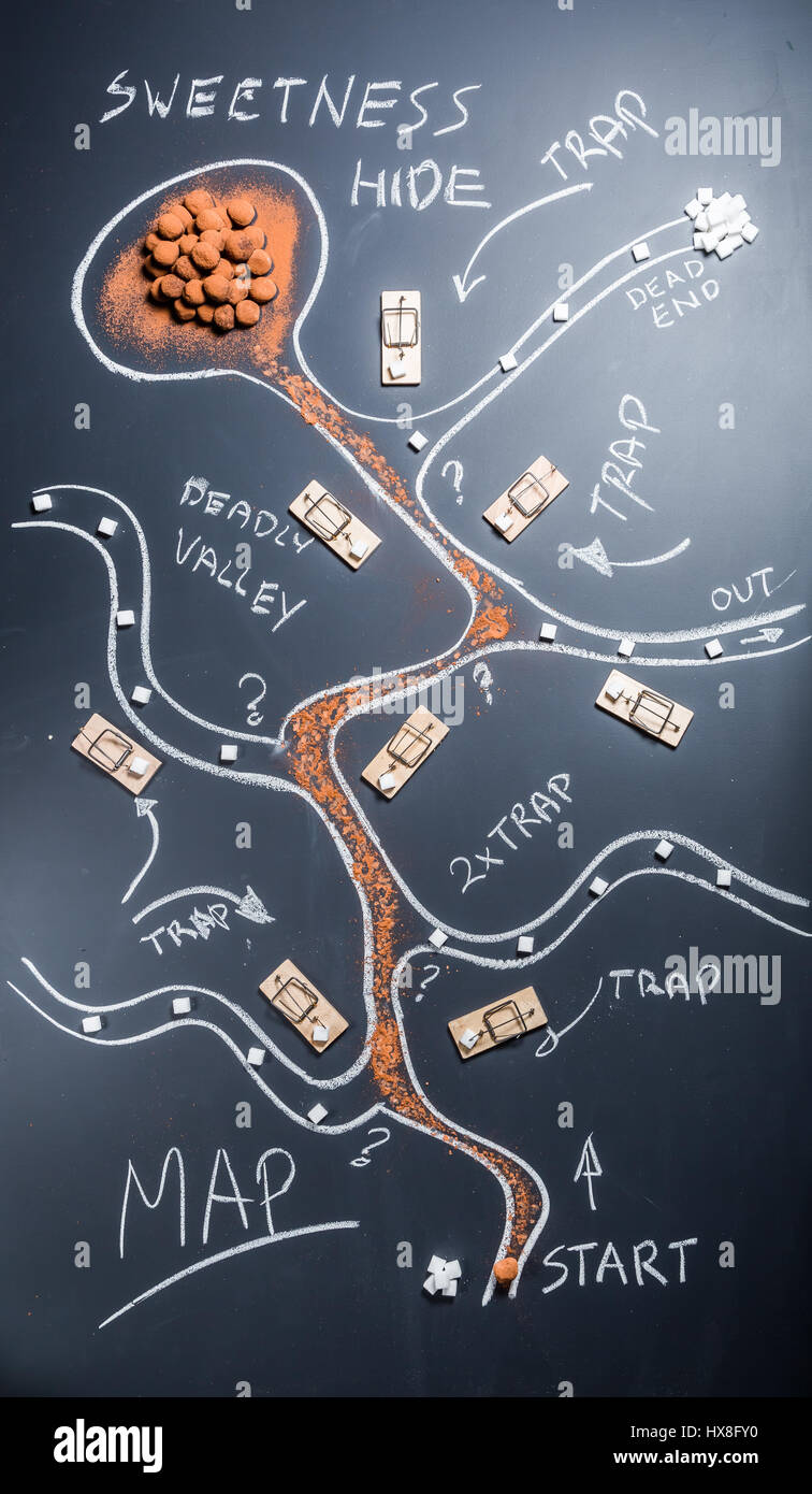 Map full of sweet surprises on black blackboard Stock Photo - Alamy