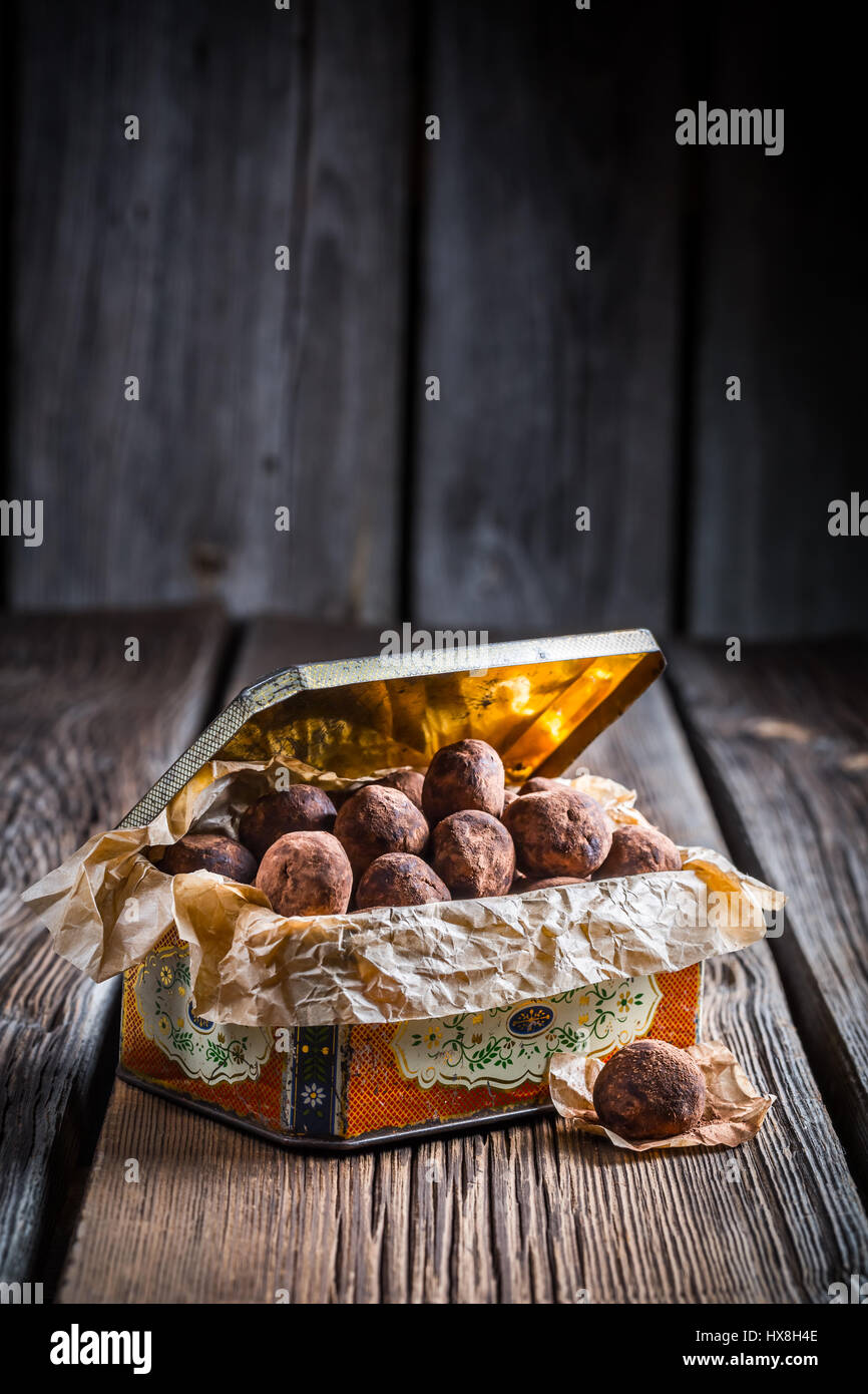 Chocolate balls in the vintage red box Stock Photo - Alamy