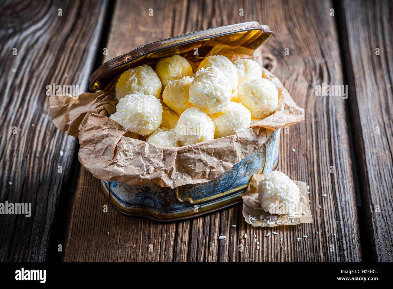 Closeup of coconut balls in blue box Stock Photo - Alamy