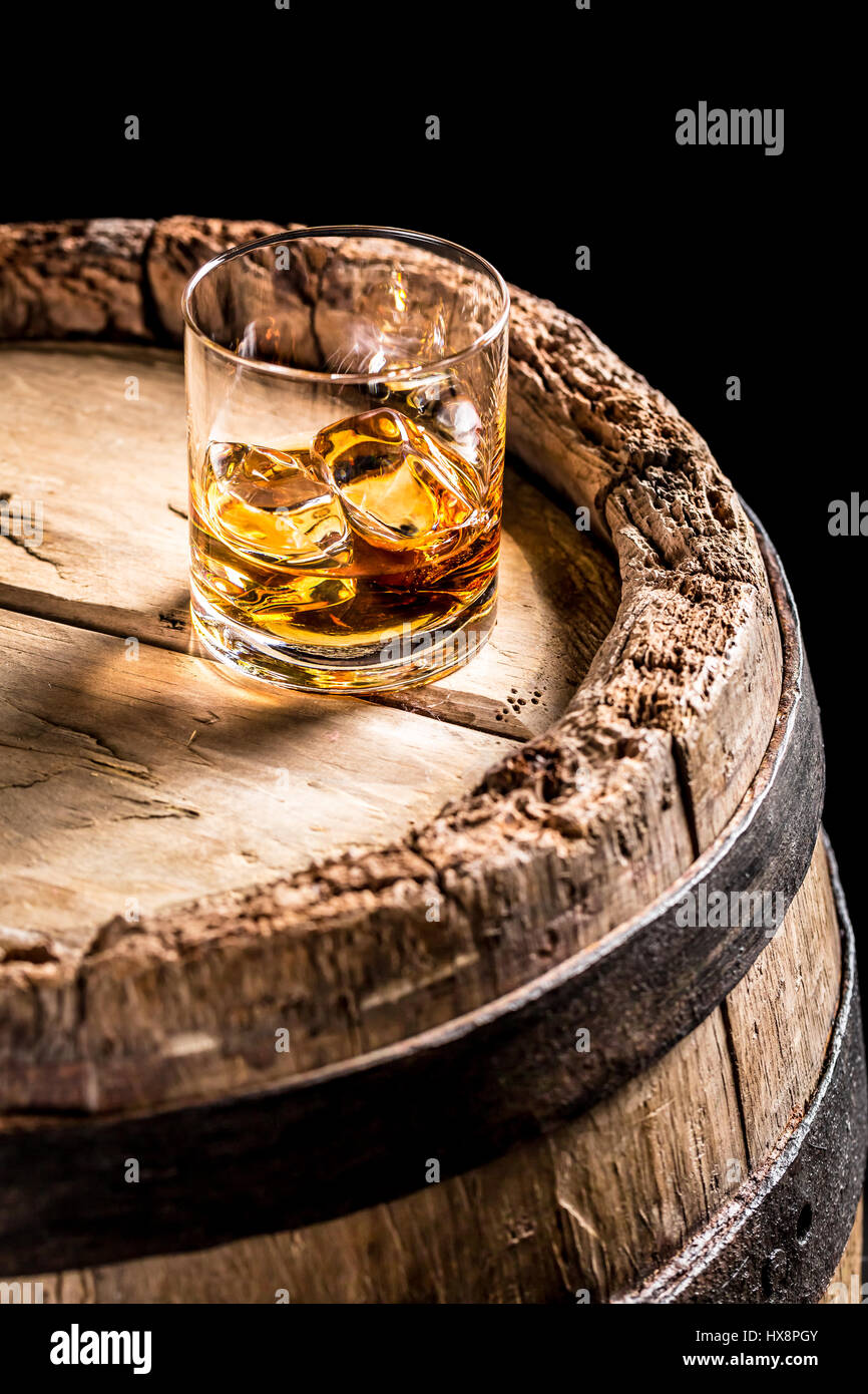 Glass of aged Scotch in the distillery basement Stock Photo - Alamy