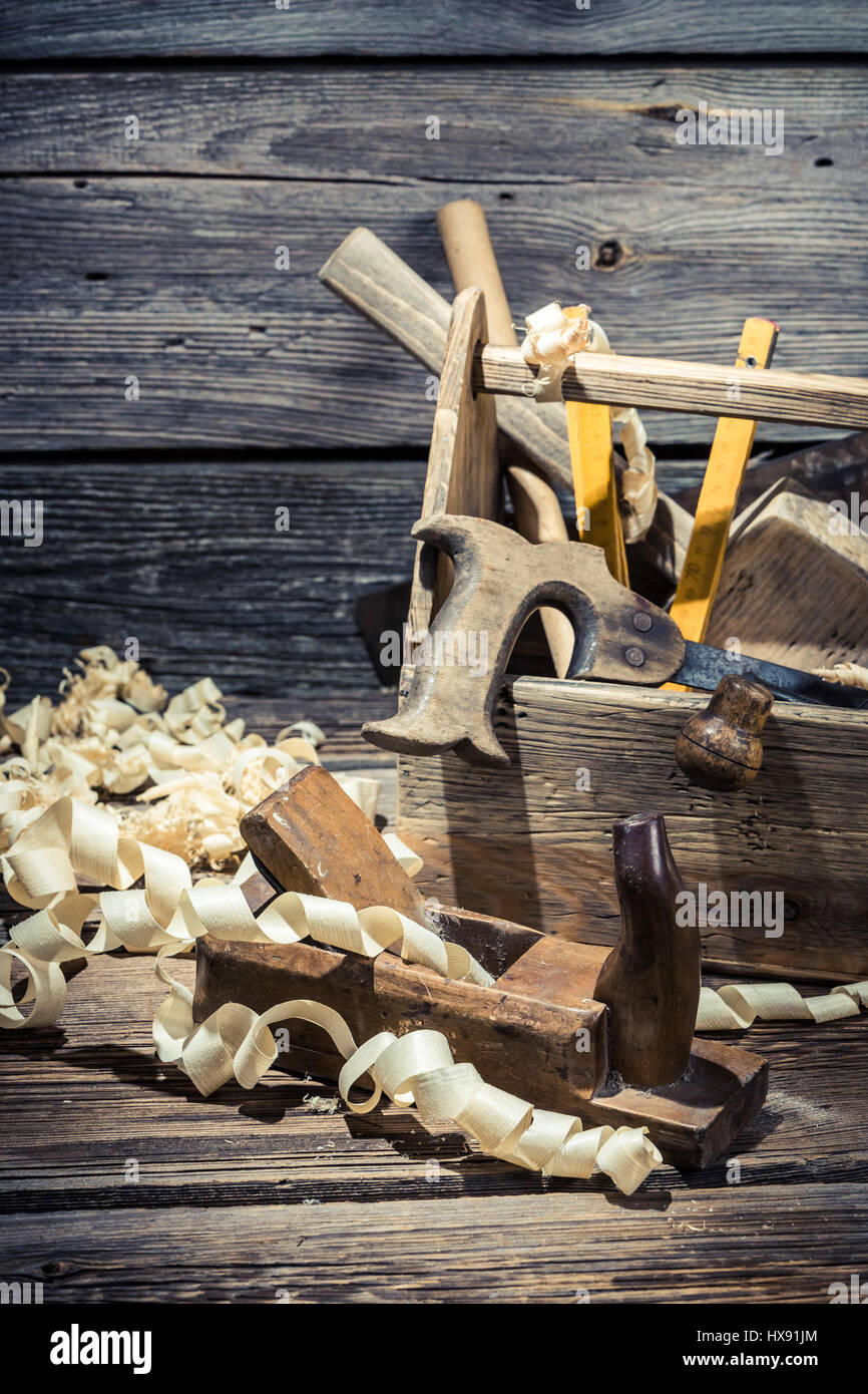Vintage joinery tool box on old wooden table Stock Photo - Alamy