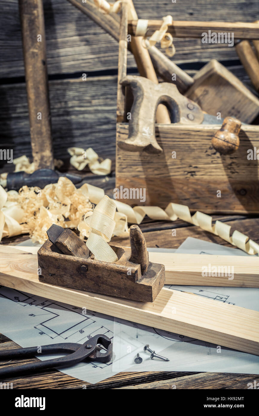 In the old carpentry workbench on old wooden table Stock Photo - Alamy