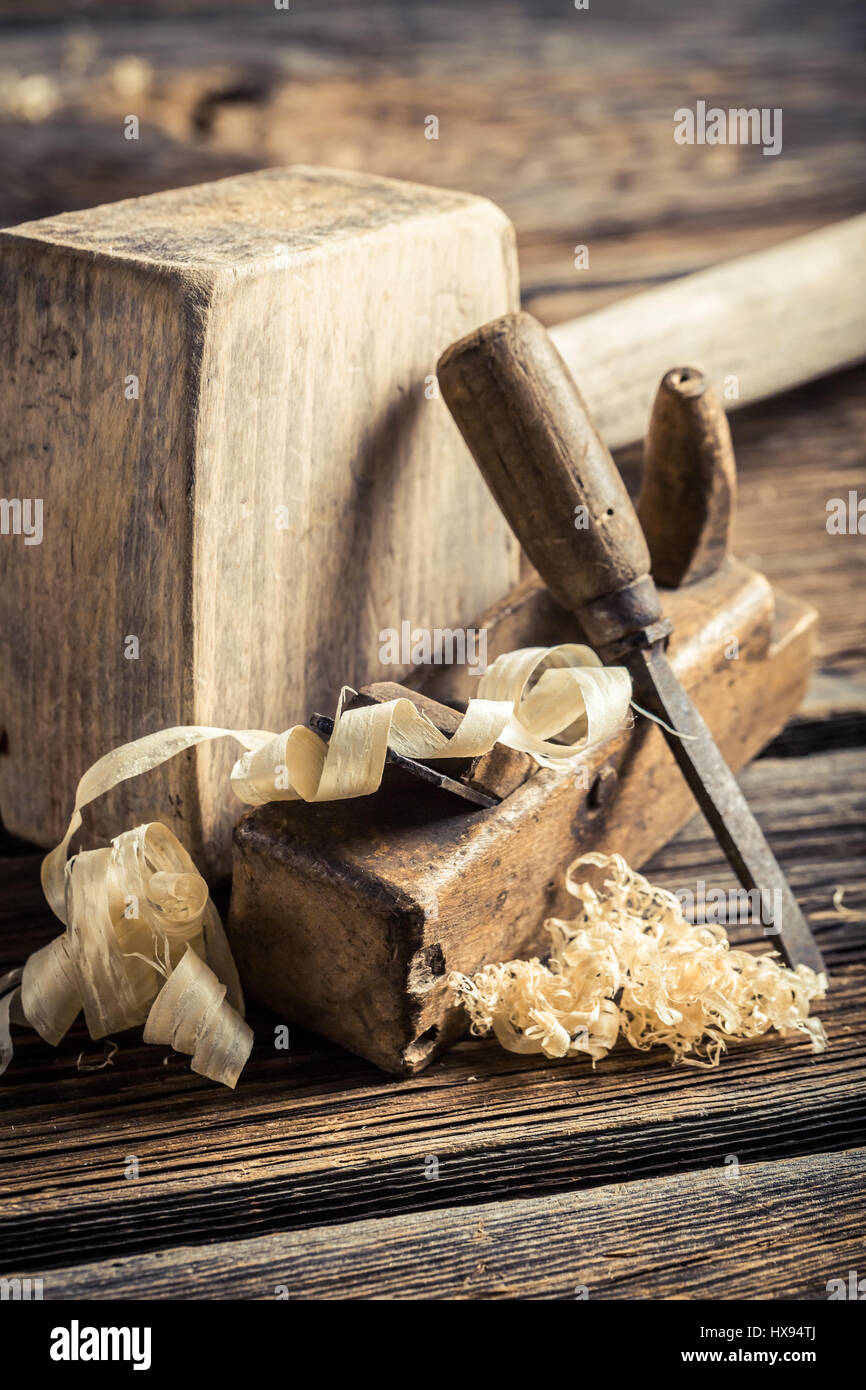 Wooden hammer, planer and chisel on a carpentry workbench Stock Photo ...