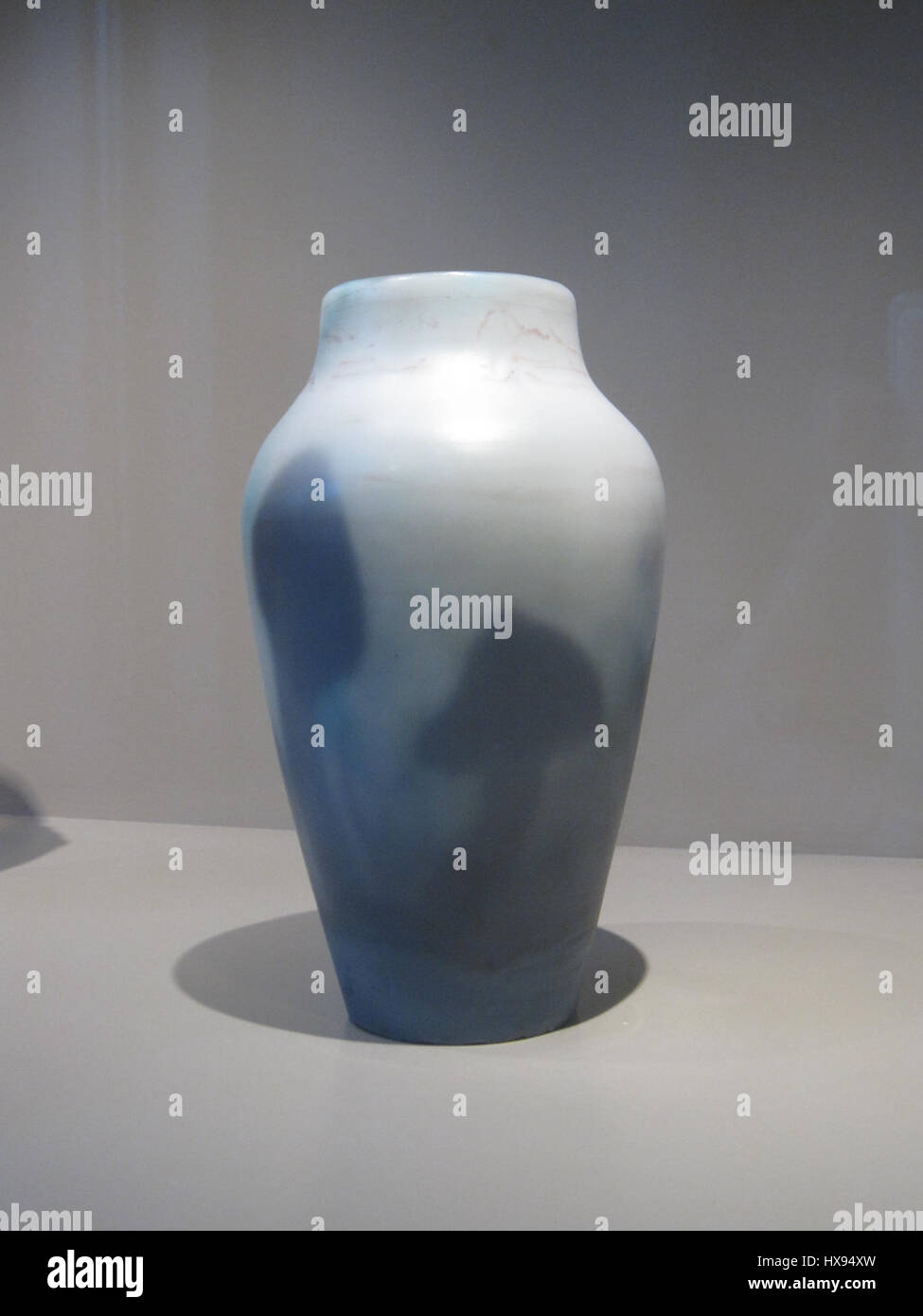 This vase, designed by the renowned French artist Emile Gallé, features ...