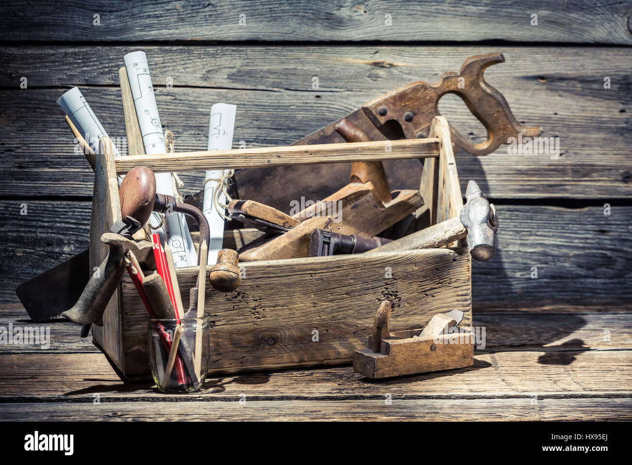 Saw, hammer and planer in the carpentry toolbox Stock Photo - Alamy