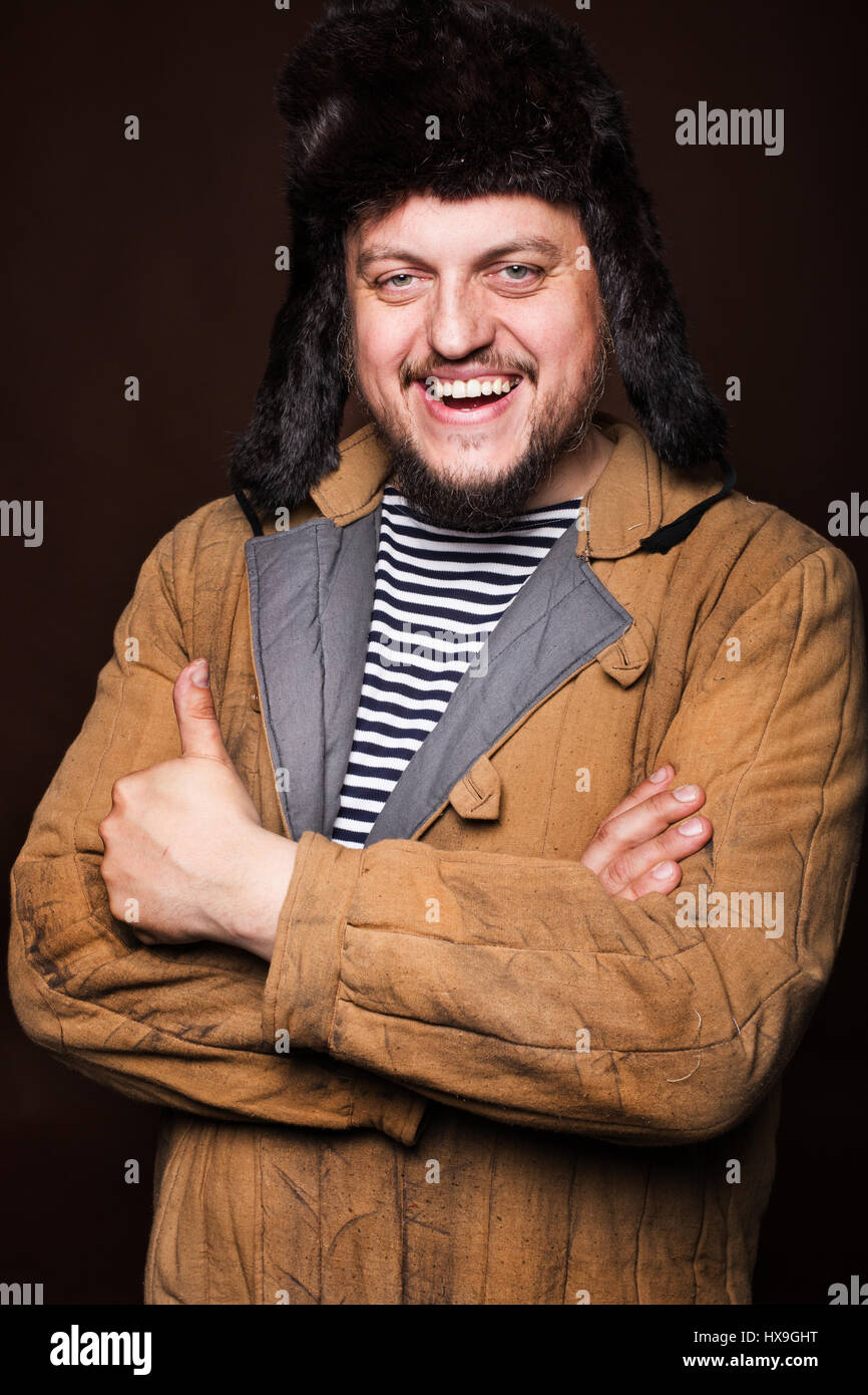 Retro russian man. Studio portrait isolated on brown background Stock ...