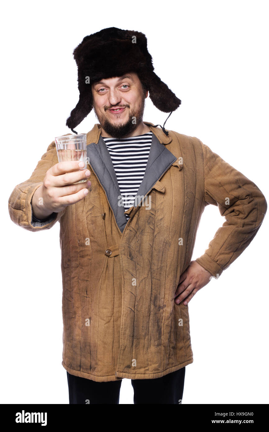 Happy russian man drink a vodka, cheers. Studio portrait isolated on ...