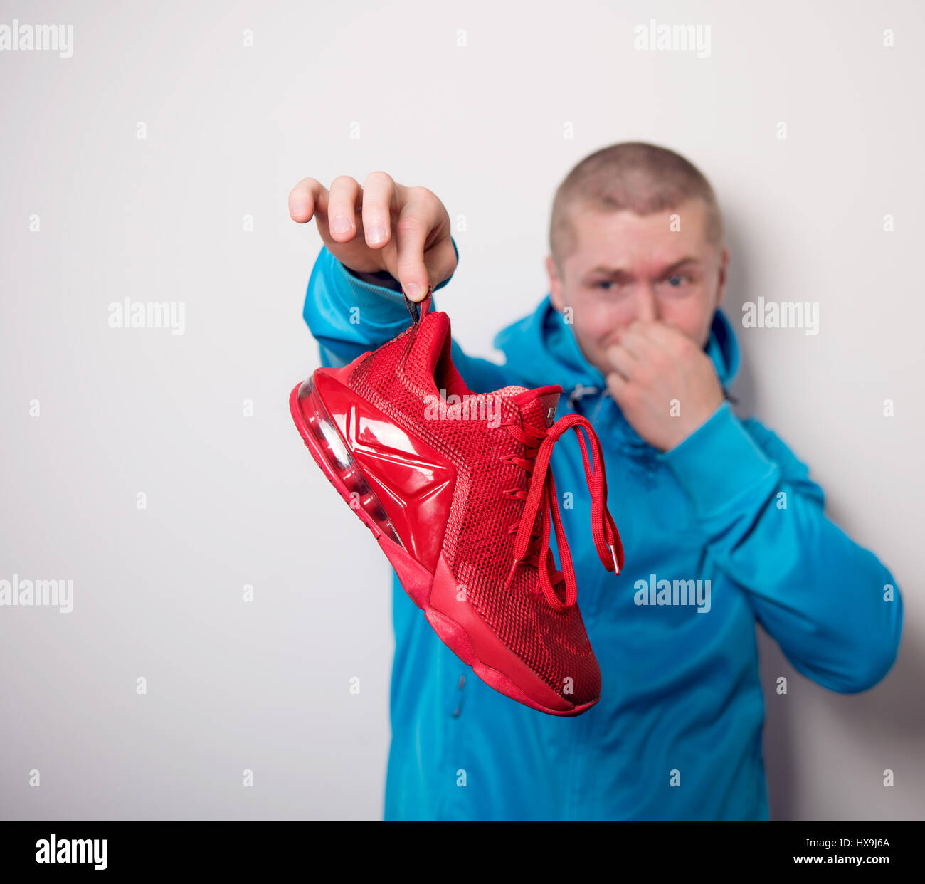 athlete air stinky red sneakers Stock Photo - Alamy