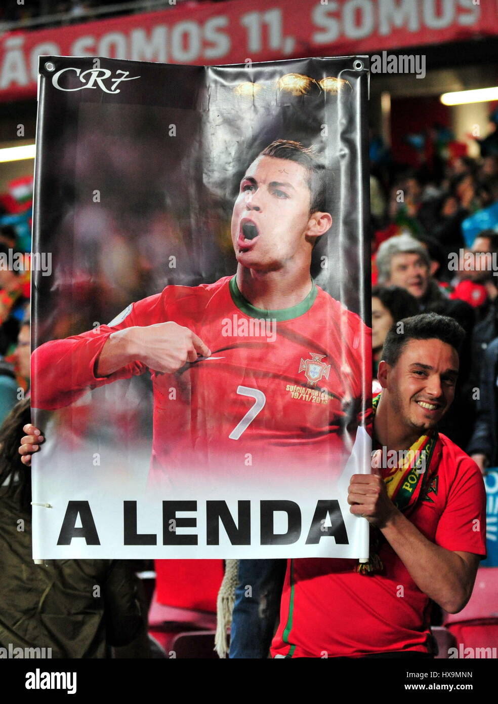 Lisbon, Portugal. 25th Mar, 2017. A fan holds a poster of Portugal's ...
