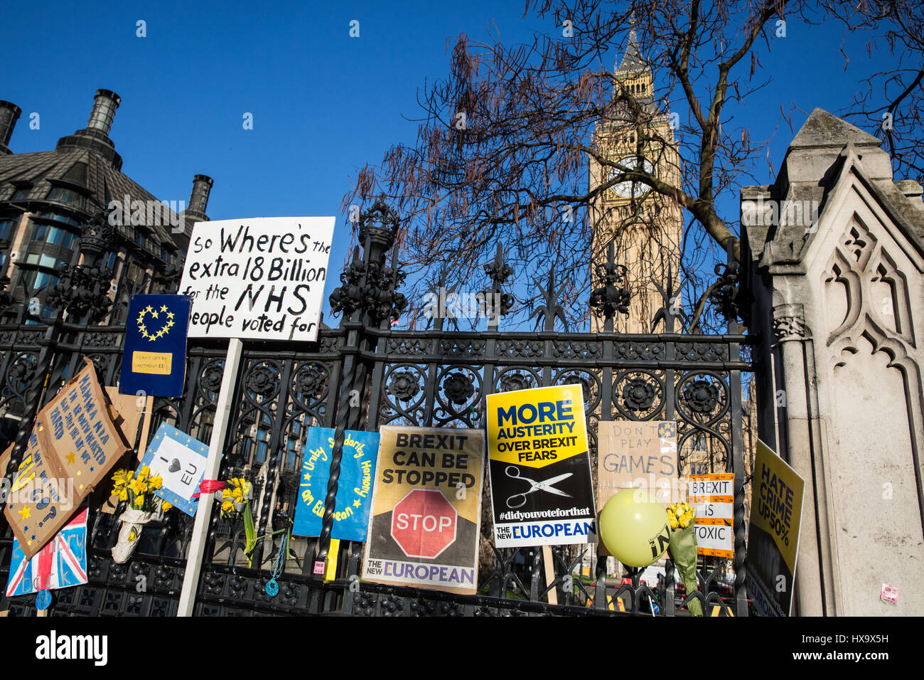 London, UK. 25th March, 2017. Placards arranged on the perimeter fence ...