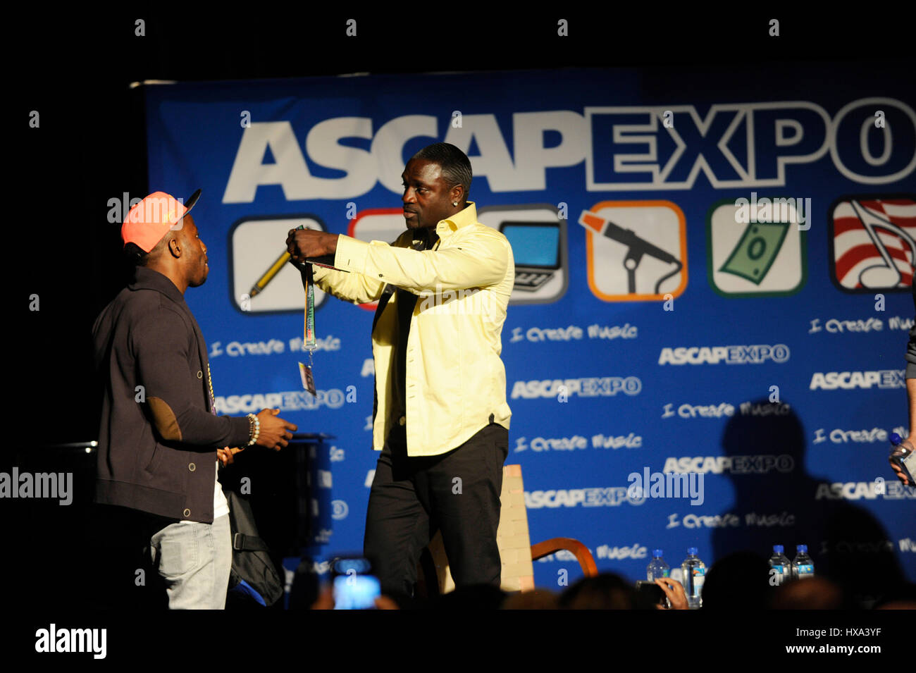 Akon gives a fan his pass back at his panel at the 9th annual ASCAP "I ...