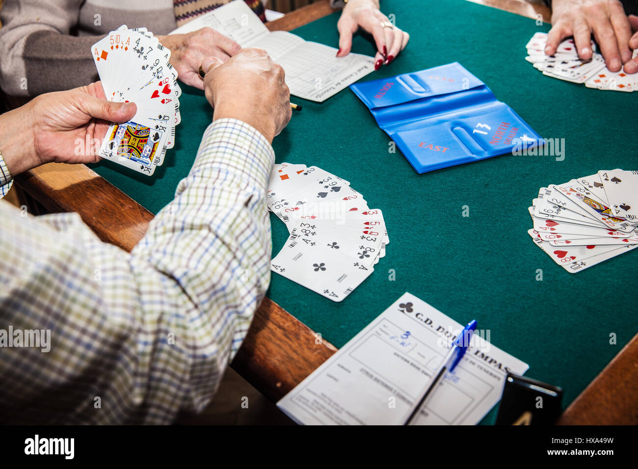 old people playing bridge game Stock Photo - Alamy