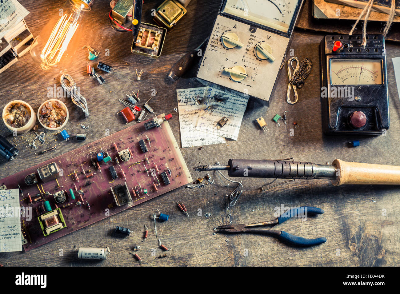 Electronics work desk in laboratory on old wooden table Stock Photo - Alamy