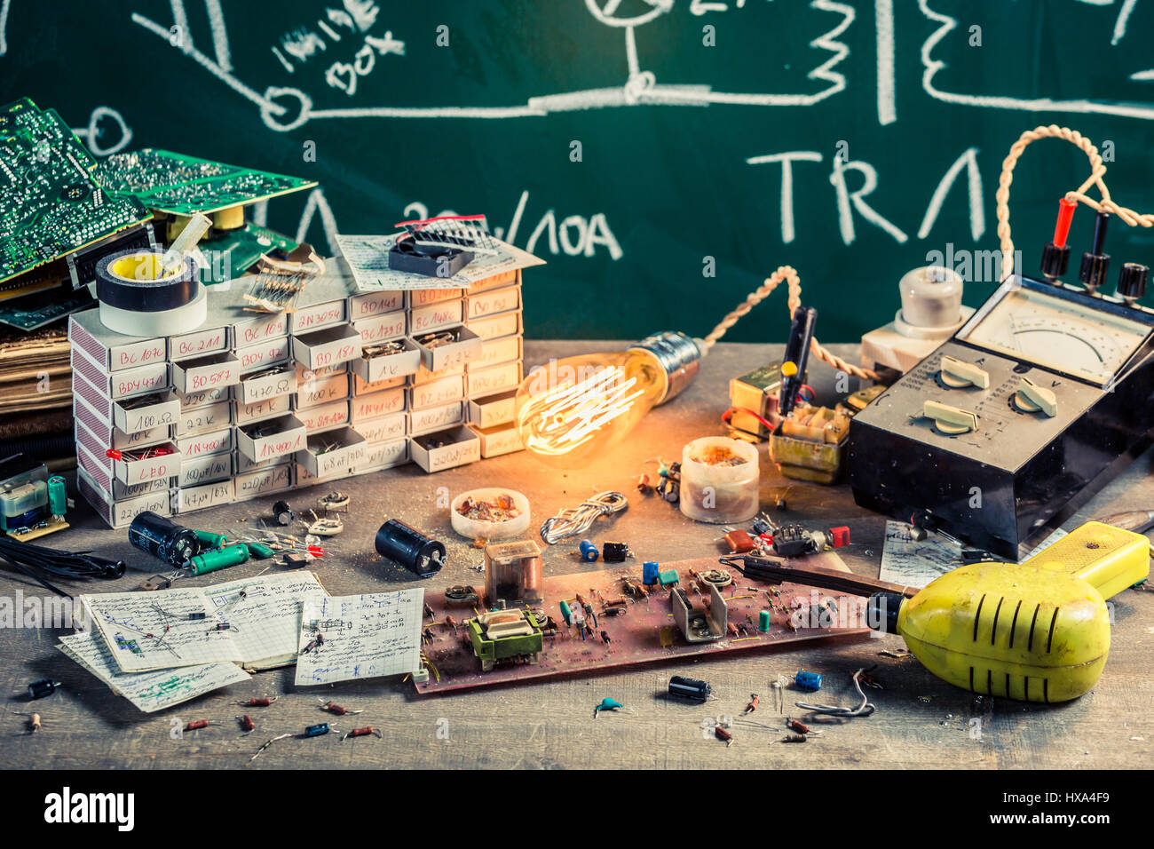 Old electronics workshop in laboratory on old wooden table Stock Photo ...