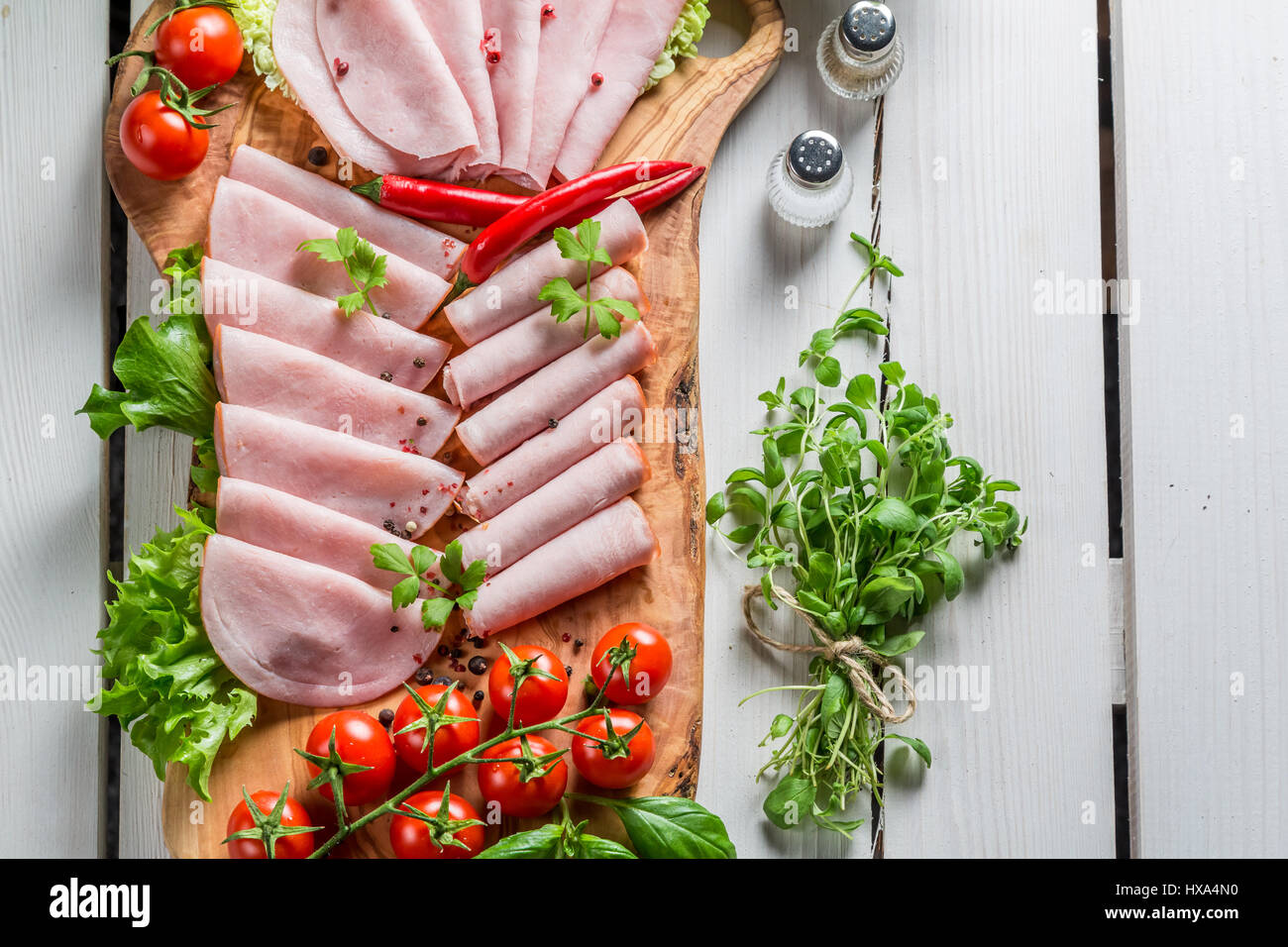 Smoked cold cuts with pepper and herbs Stock Photo - Alamy