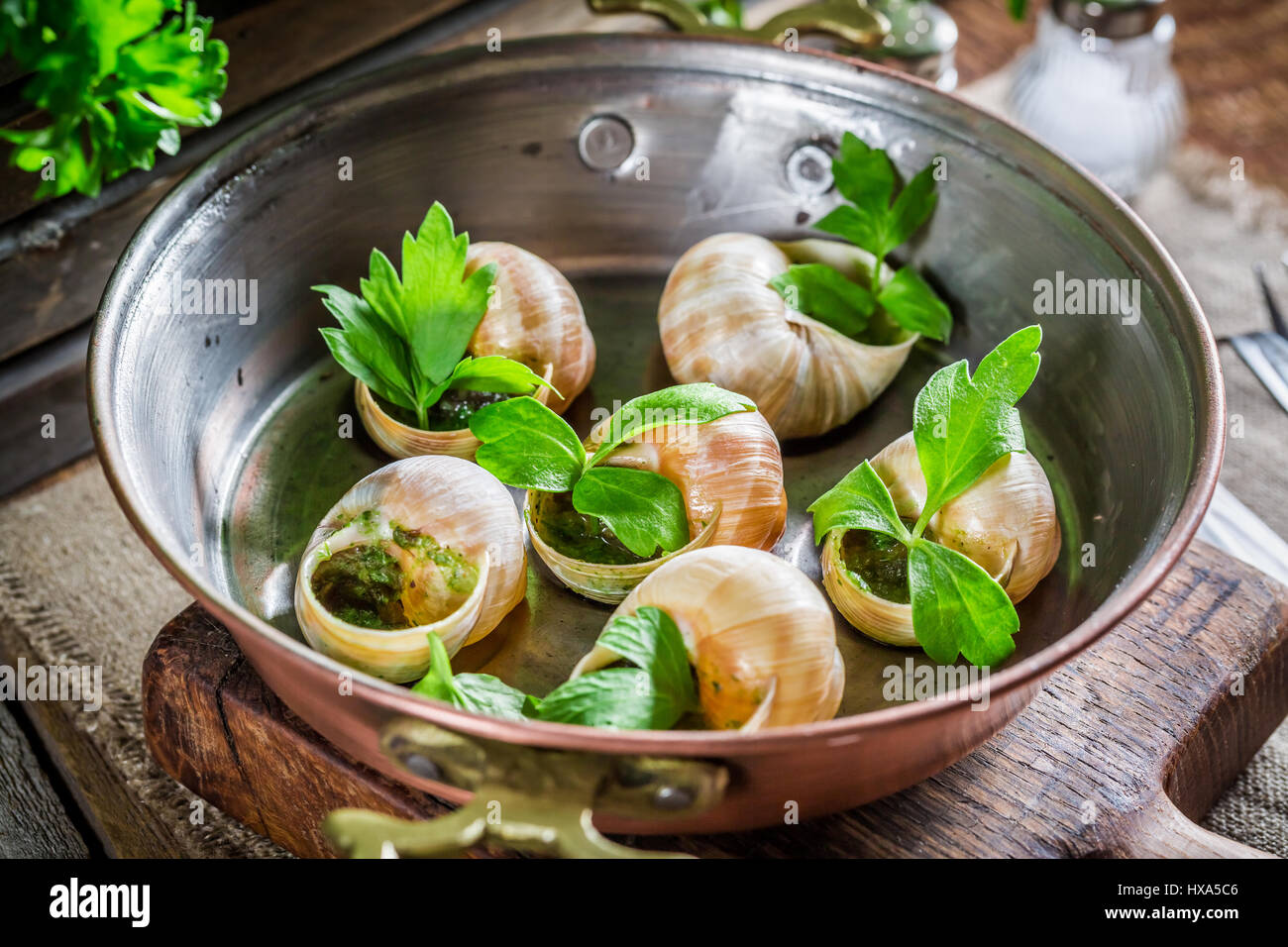Cooking snails garlic butter hi-res stock photography and images - Alamy