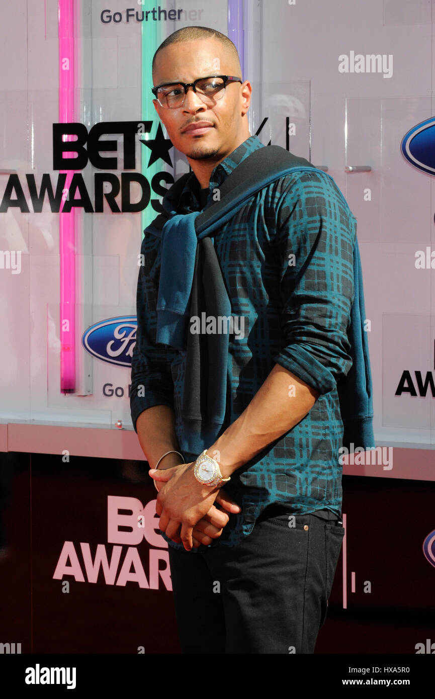 Rapper T.I. attends the BET AWARDS '14 red carpet at Nokia Theatre L.A ...