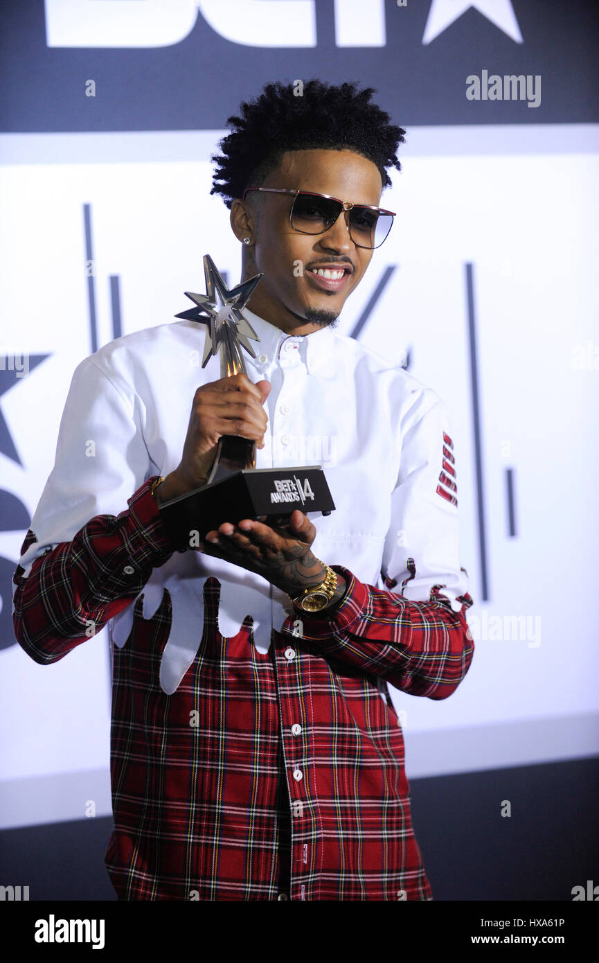 Singer August Alsina poses in the press room at the 2014 BET Awards at ...