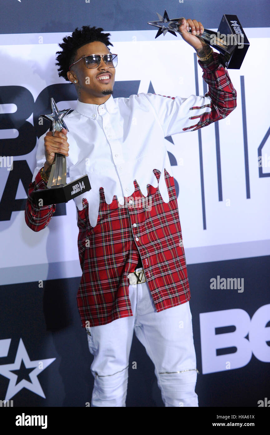 Singer August Alsina poses in the press room at the 2014 BET Awards at ...
