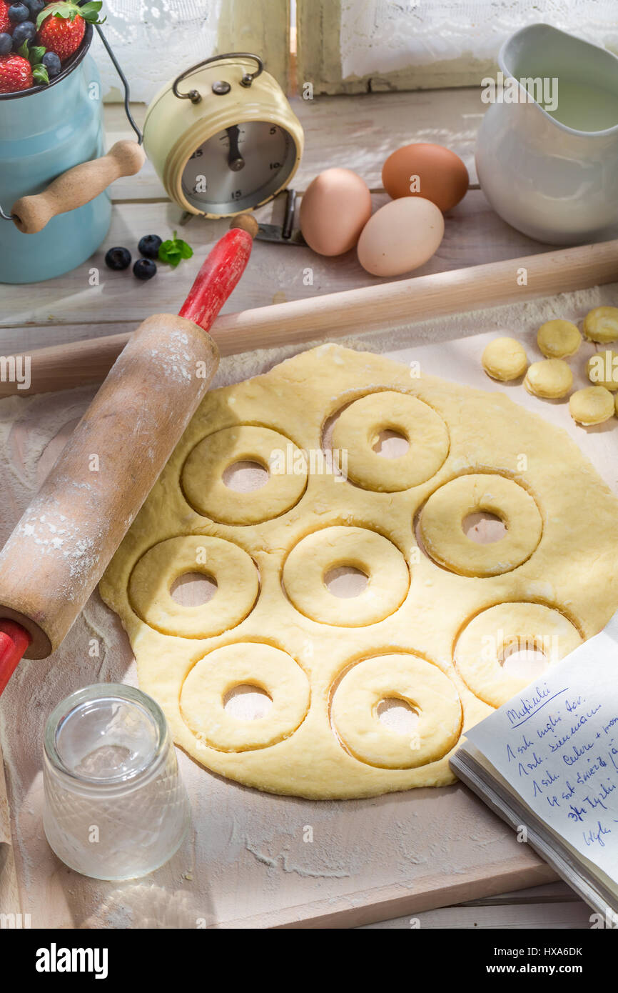 Sweet donuts in the rustic kitchen on old white table Stock Photo - Alamy