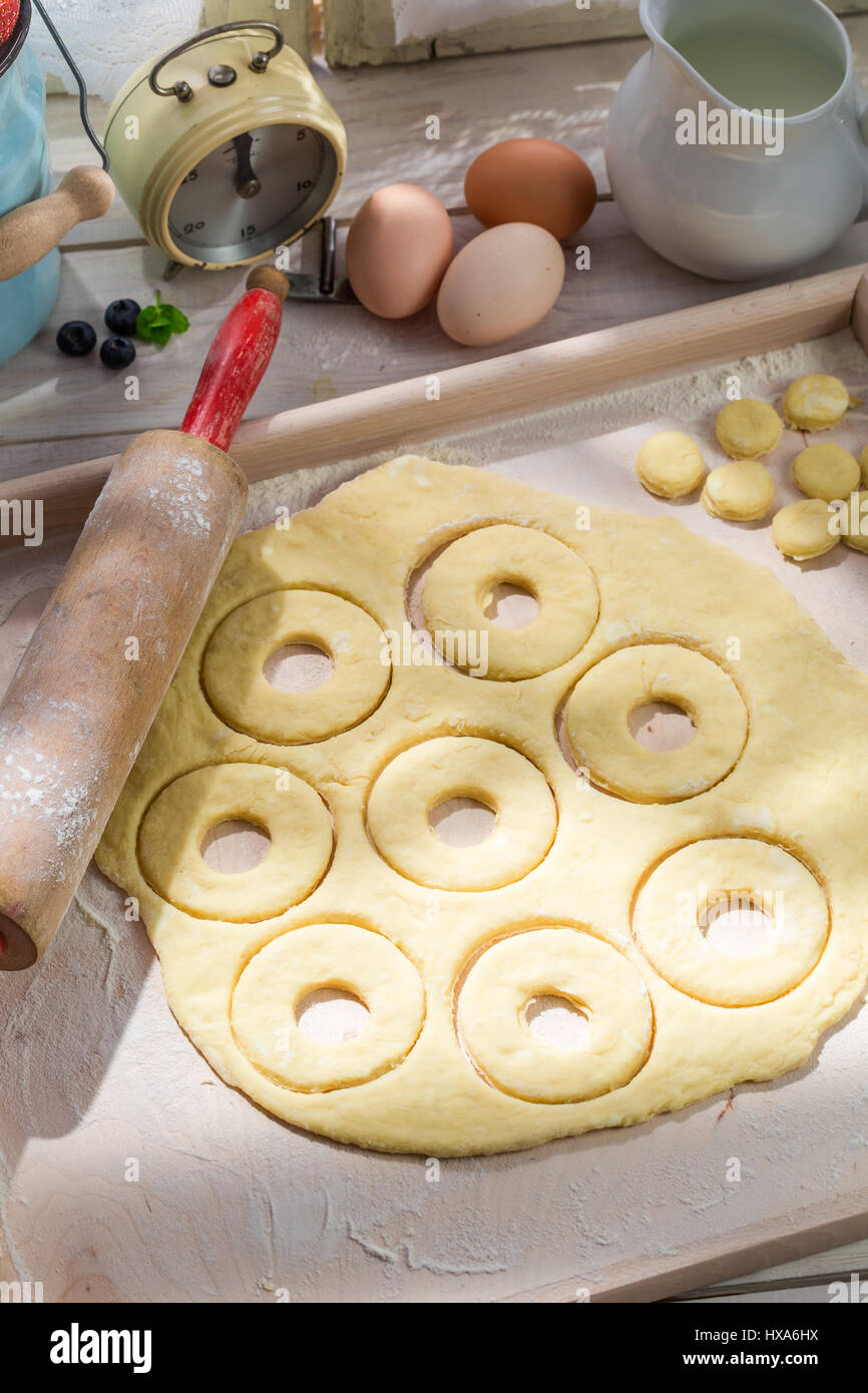 Preparation for homemade donuts in the sunny kitchen Stock Photo - Alamy