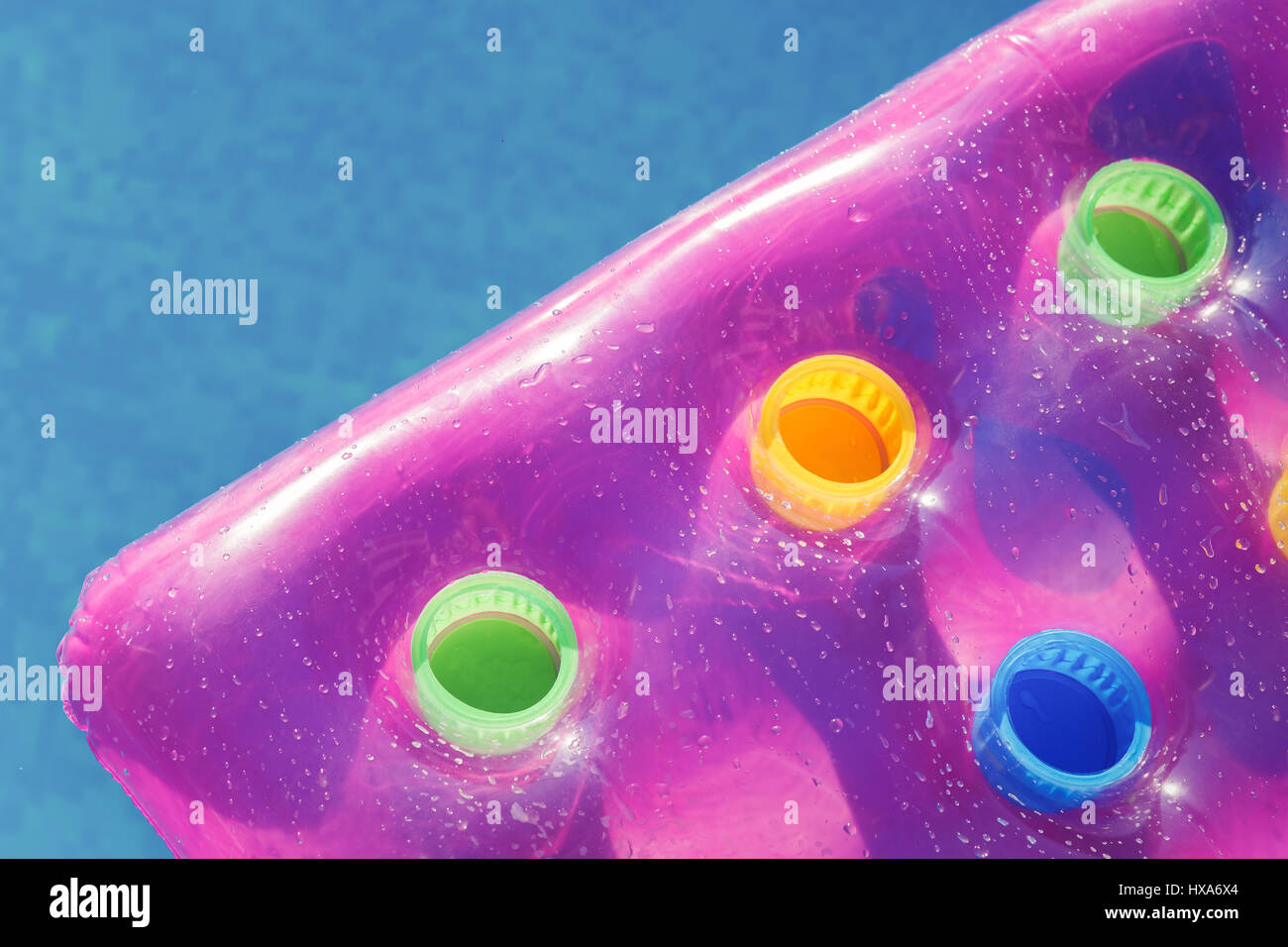 Pink air mattress in swimming pool. Holiday background. Outdoors Stock ...