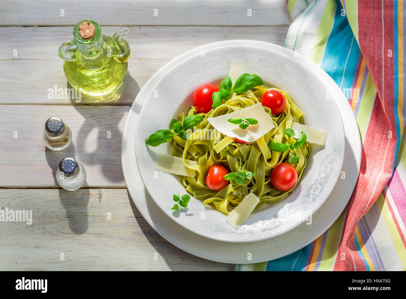 Homemade tagliatelle with parmesan on old white table Stock Photo - Alamy