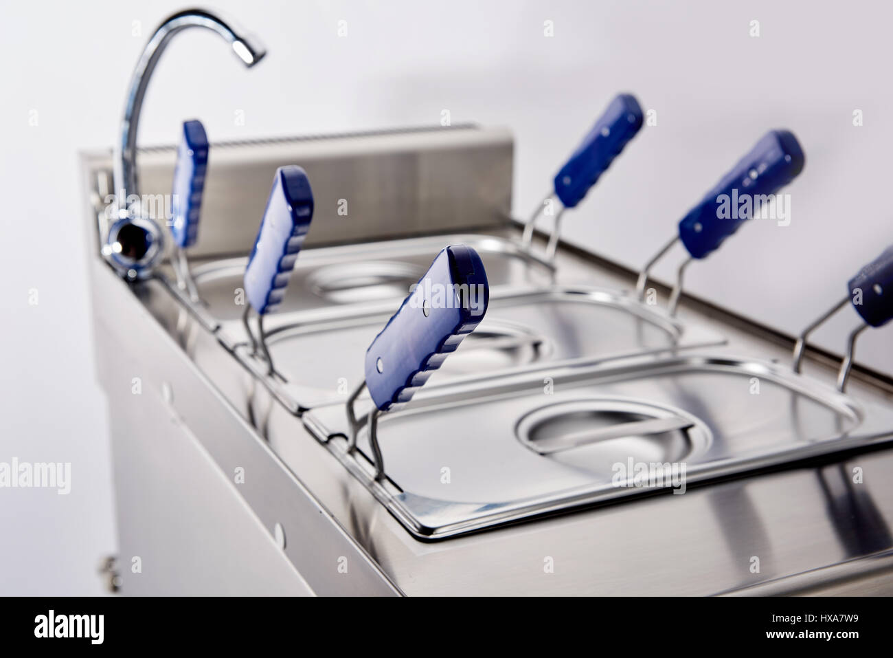clean deep fryer close up photo in kitchen hi Stock Photo - Alamy