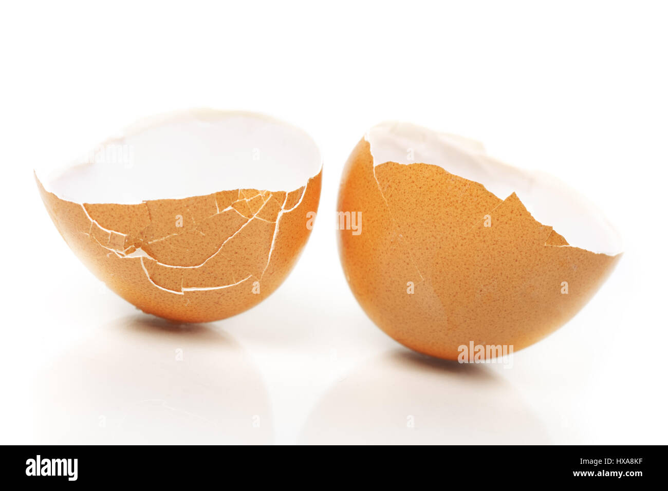 Egg shell isolated on white background Stock Photo - Alamy