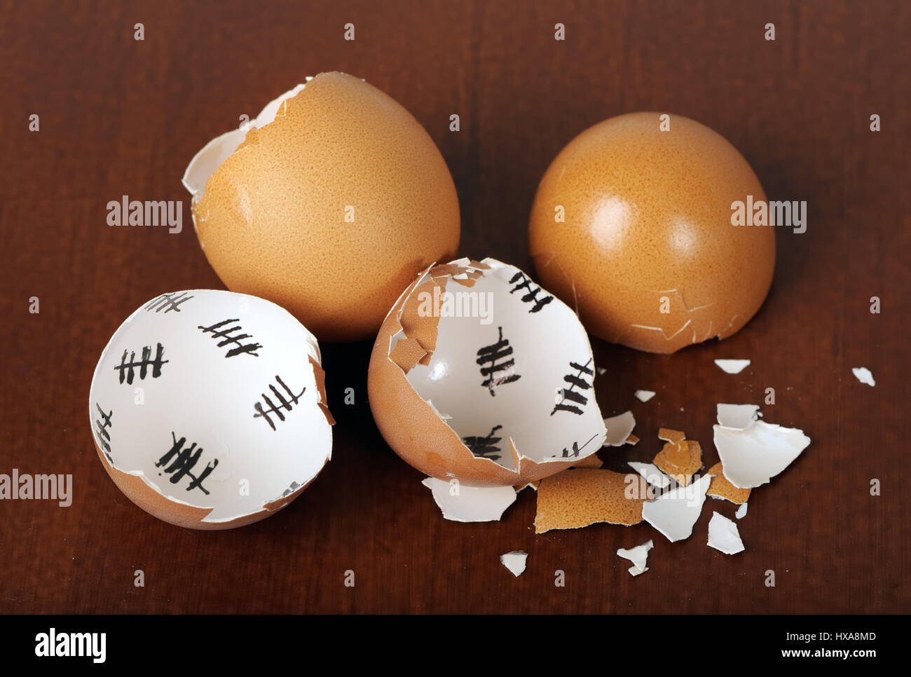 Broken egg shell closeup on dark background Stock Photo - Alamy