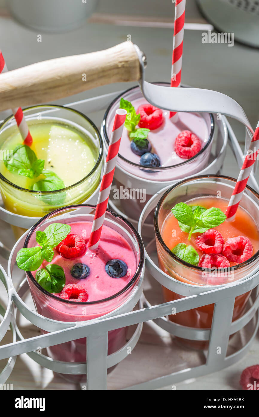 Summer smoothie with fruits on old white table Stock Photo - Alamy