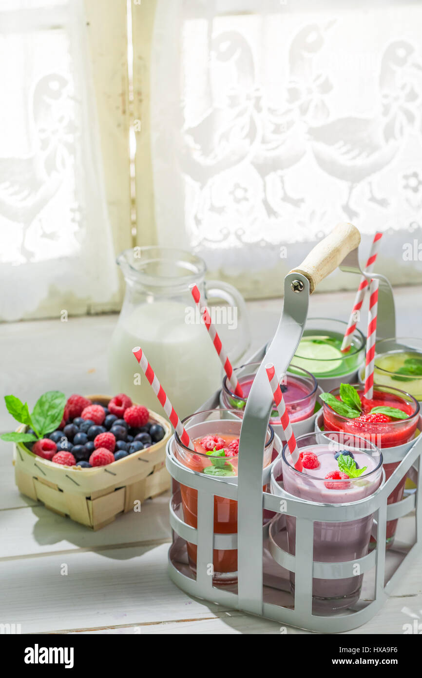 Homemade smoothie with fruity yogurt on old white table Stock Photo - Alamy