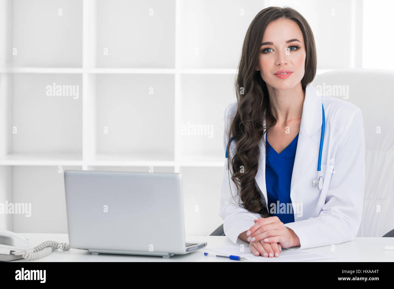 Portrait of beautiful female doctor in a clinical office Stock Photo ...