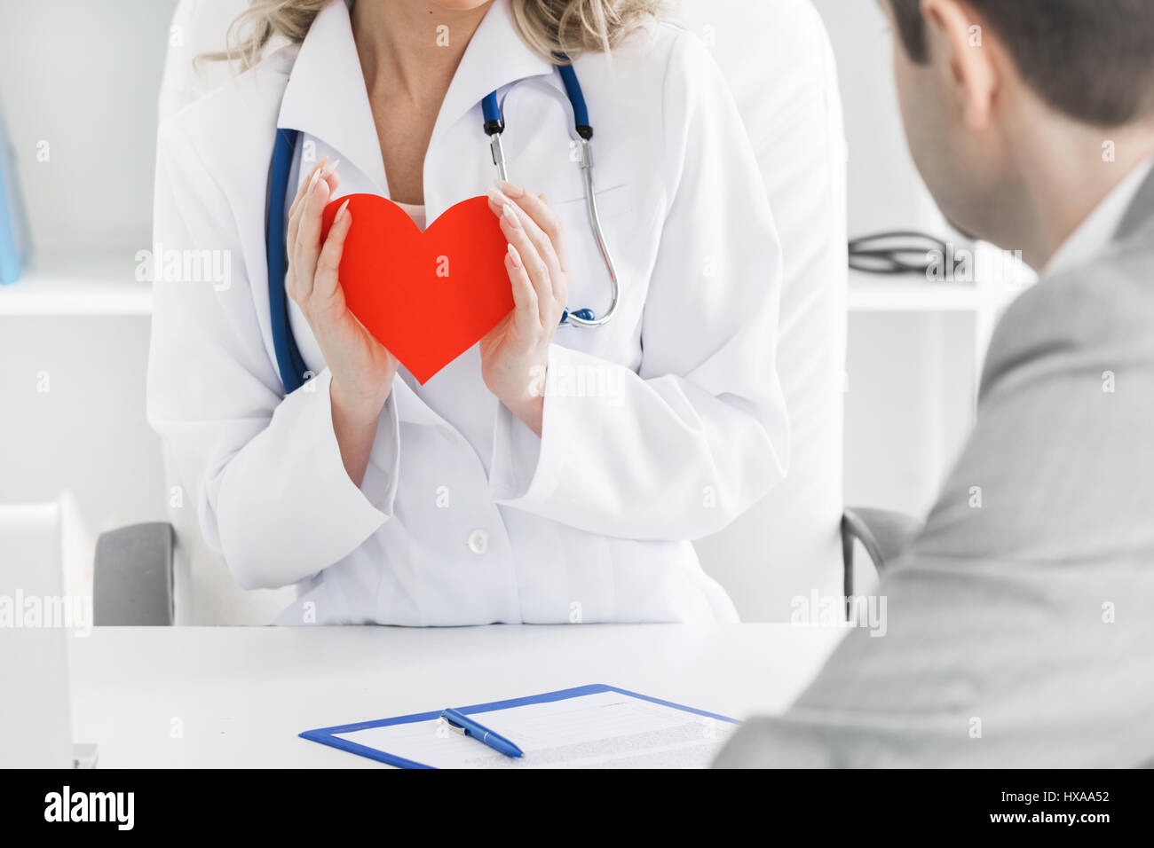 Doctor patient consultation red hi-res stock photography and images - Alamy