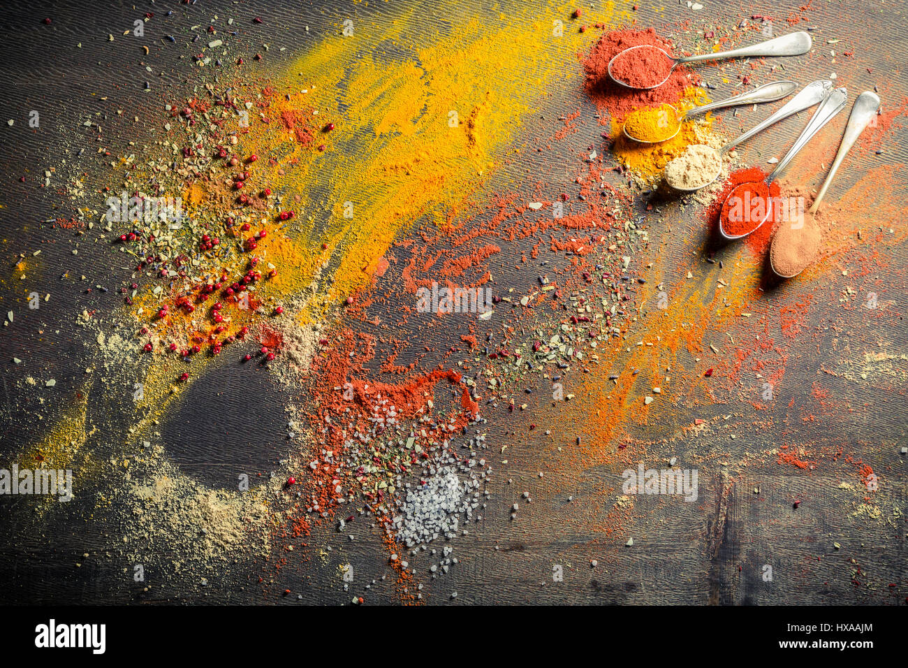 Good spices and herbs on old table Stock Photo - Alamy