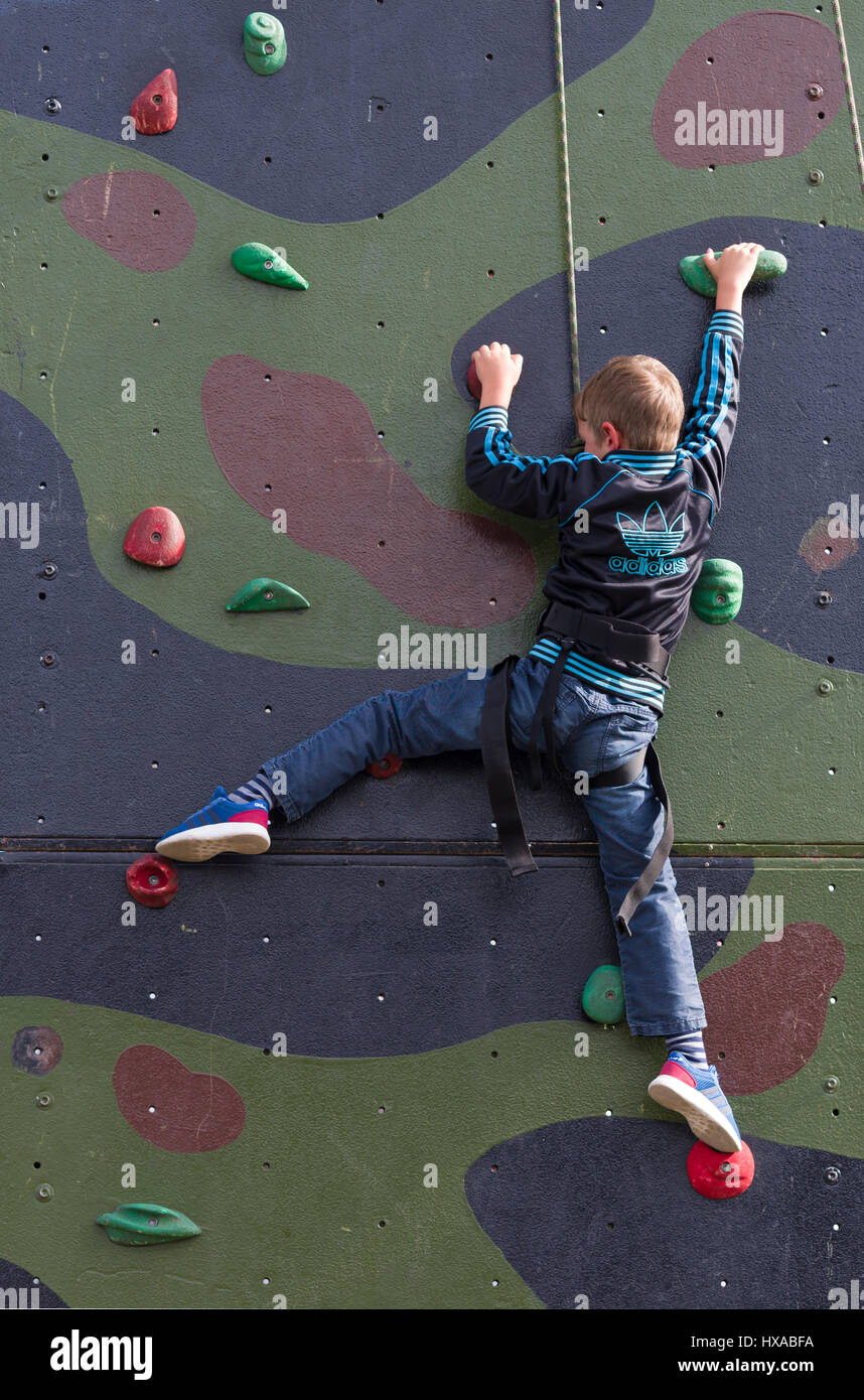 Boy climbing wall boys hi-res stock photography and images - Alamy