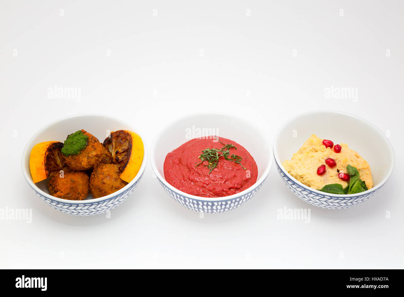 Bowls of vegetarian food with a Middle East food origin including ...