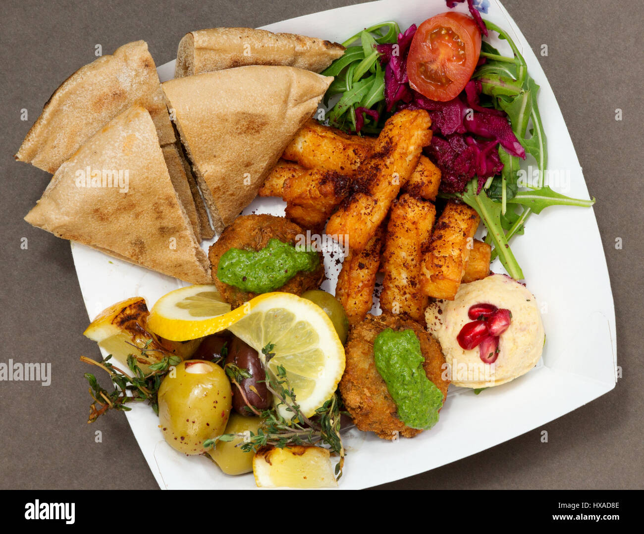 Mezze platter, pitta bread, , butternut squash fritters with zough ...