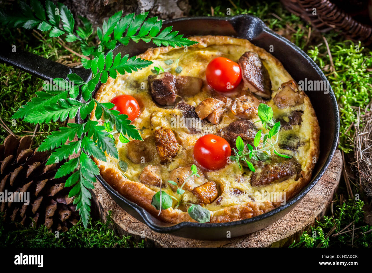Delicious scrambled eggs with mushrooms on moss Stock Photo - Alamy