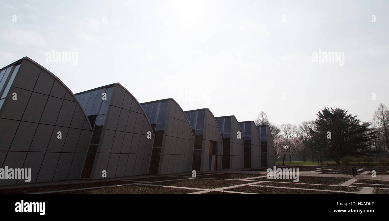 The arched exterior of the De Ploeg factory, designed by Gerrit ...