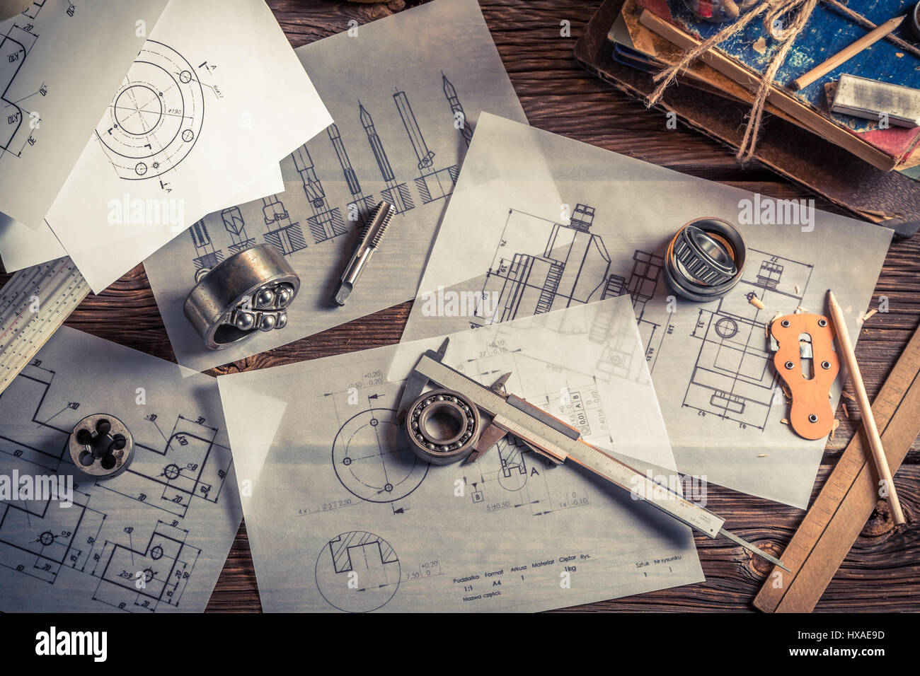 Vintage mechanical engineer desk on old wooden table Stock Photo - Alamy