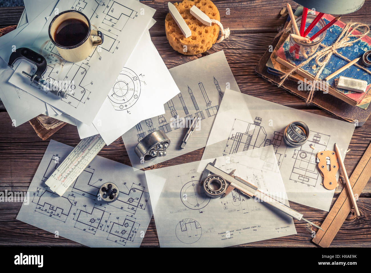 Vintage designer desk of mechanical parts on old wooden table Stock ...