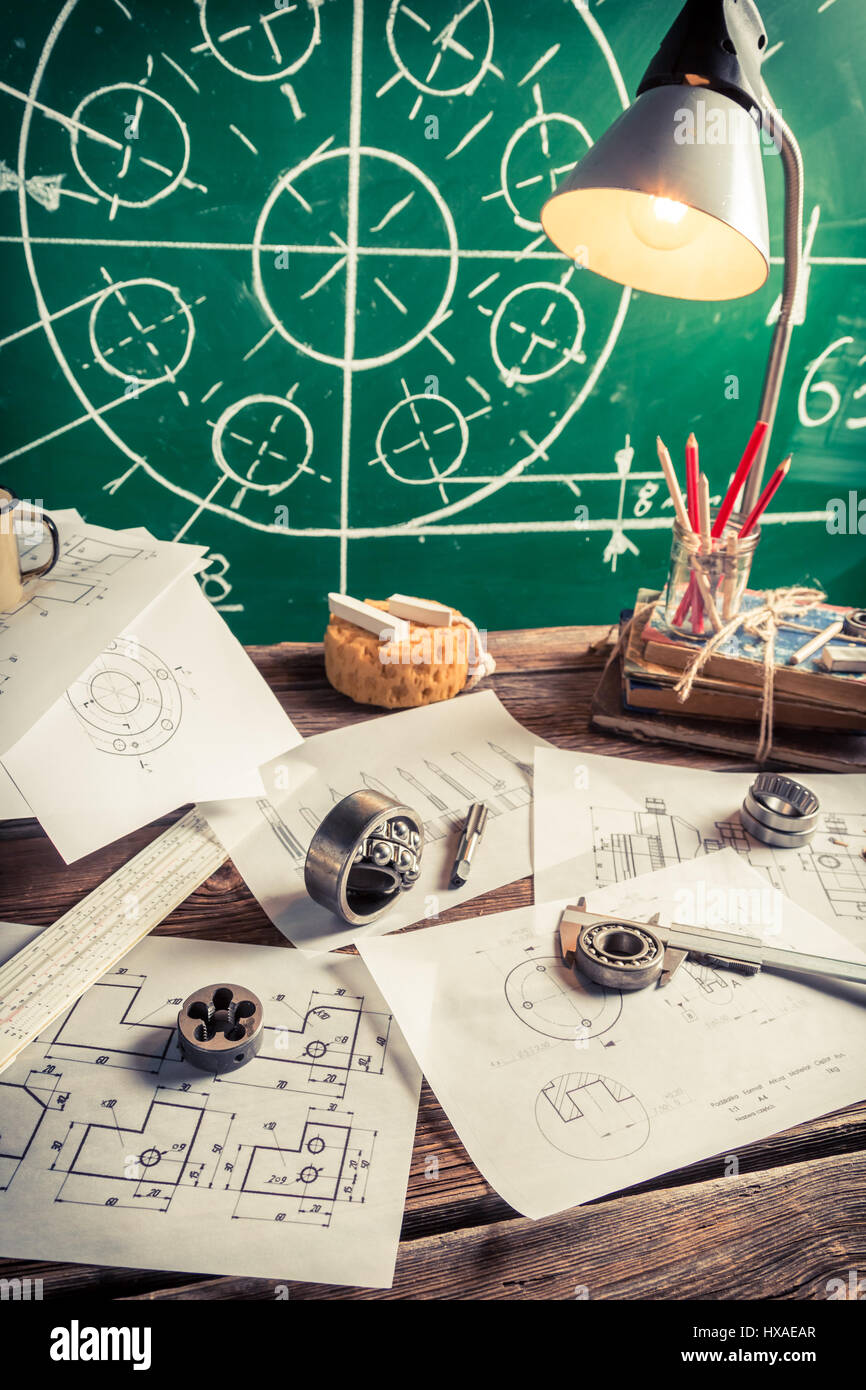 Mechanical engineer desk at the university on old wooden table Stock ...