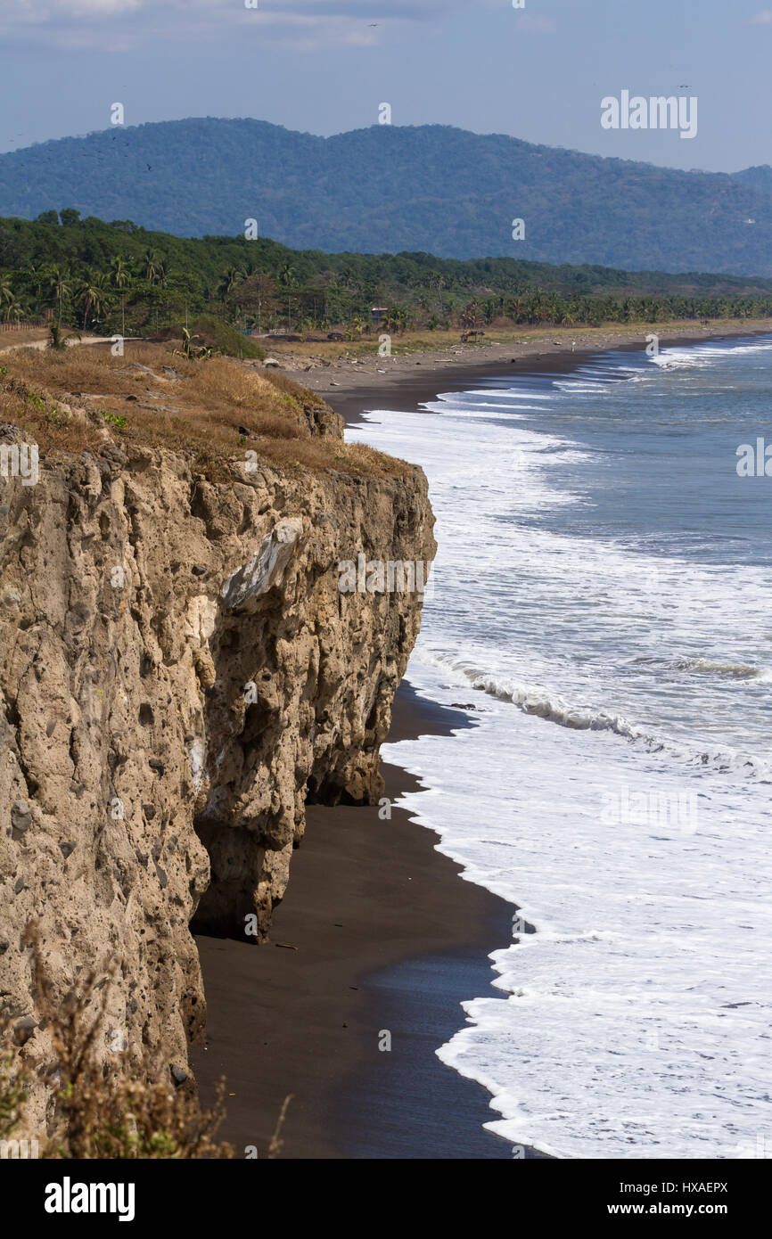 mud cliffs in a section of beach know as El Penon near Guacalillo beach ...