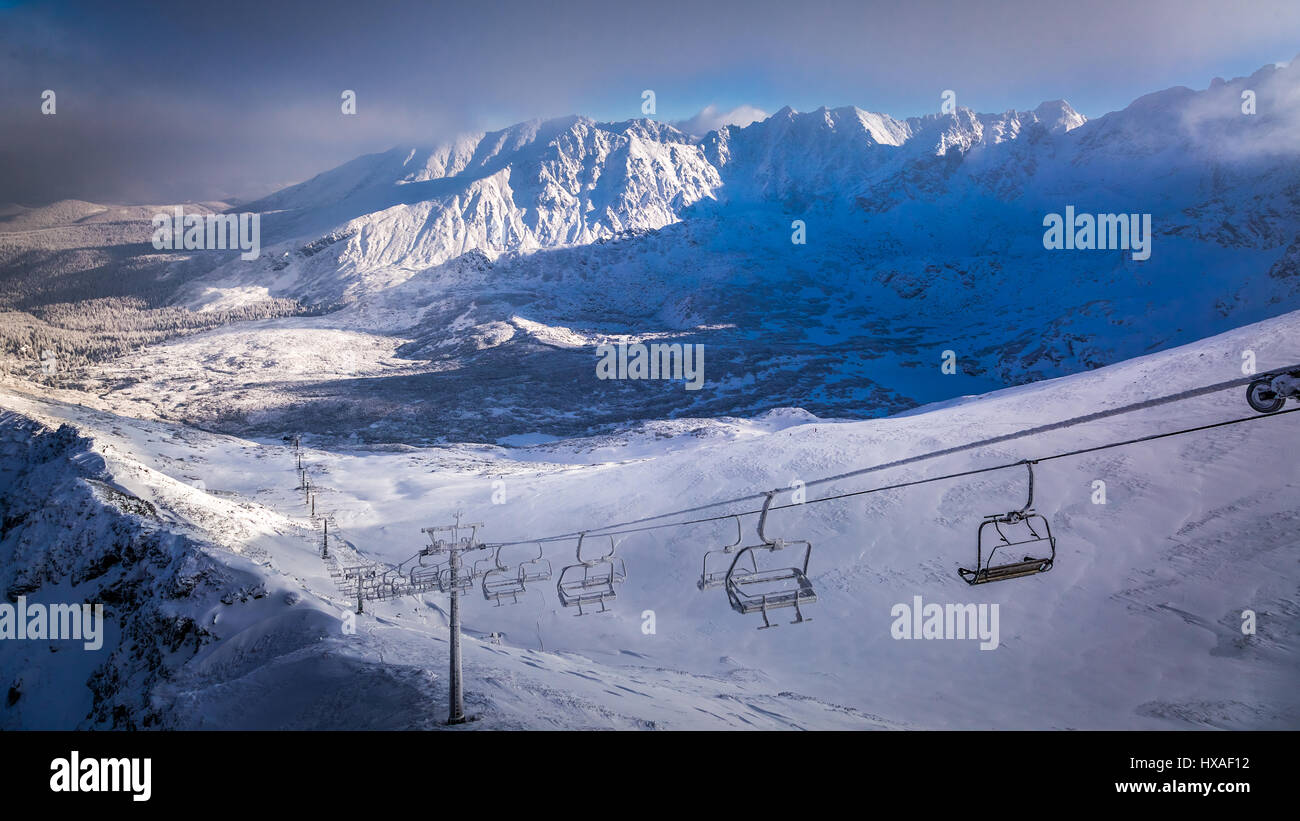 Aerial lifts above the valley in the winter Stock Photo - Alamy
