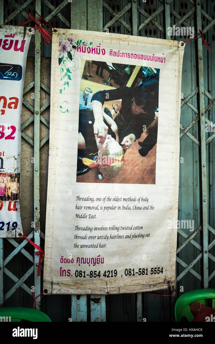 Facial epilation with the ancient method of threading in China town ...