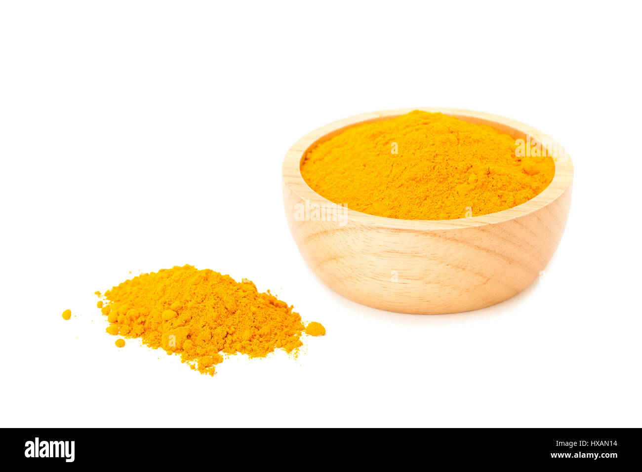 turmeric powder in wooden bowl isolated on white background Stock Photo ...